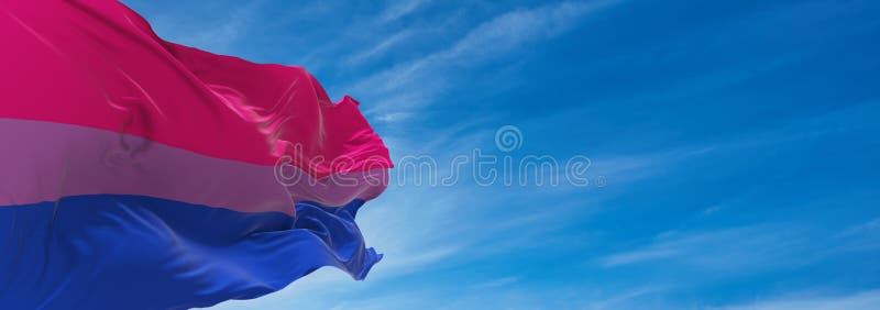 Bisexual Pride Flag Waving In The Wind At Cloudy Sky Freedom And Love