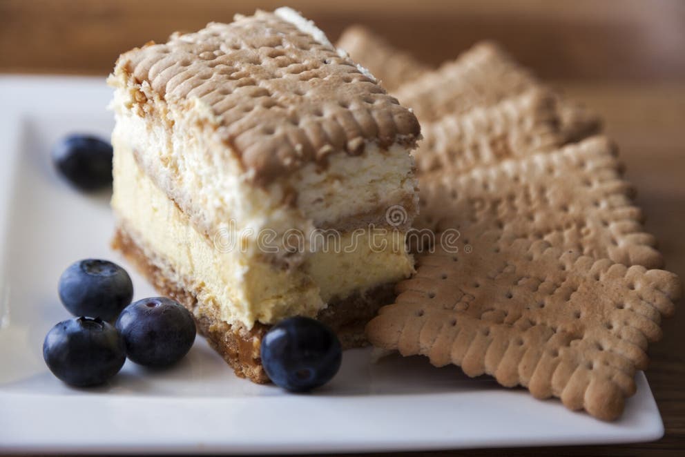 3bit cake with biscuits stock photo. Image of cream, biscuits - 74504294