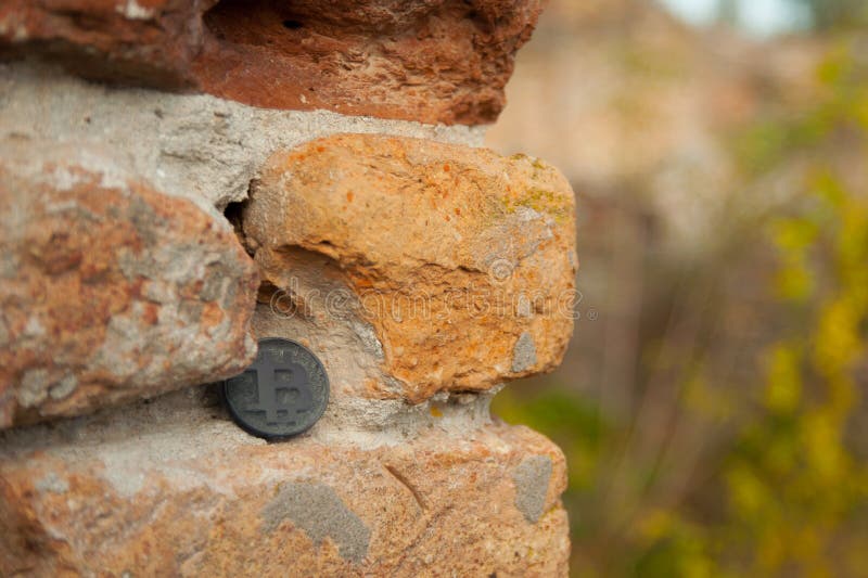 Bit Coin on old brick wall stock image. Image of banking - 128280811