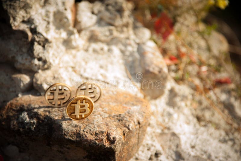 Bit Coin on old brick wall stock photo. Image of gold - 128282842