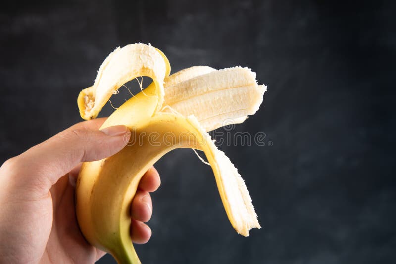 Bit off for a banana stock image. Image of delicious - 217228605