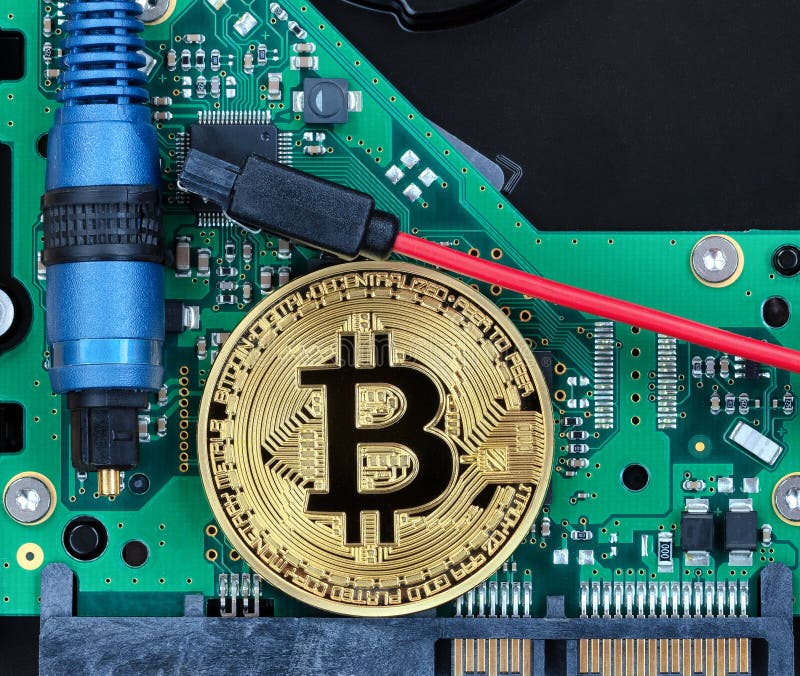 Bitcoin Coin on Circuit Board of Computer with Fiber Optic Cable Stock ...