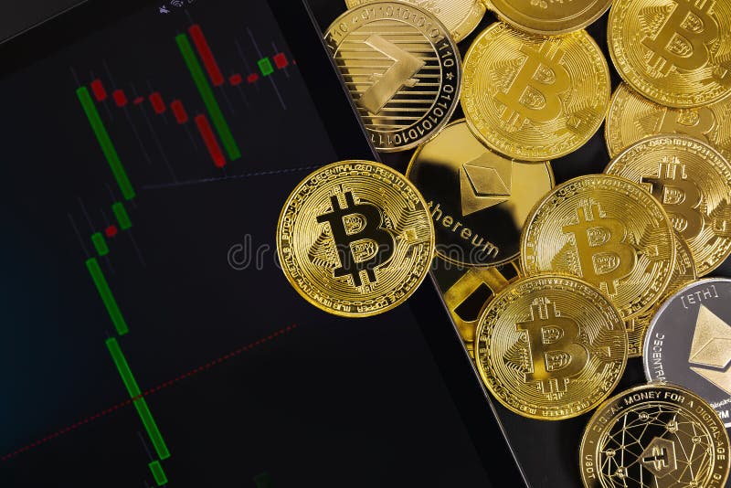 Bitcoin Coin on Digital Tablet with Graph by Various Coins Editorial ...