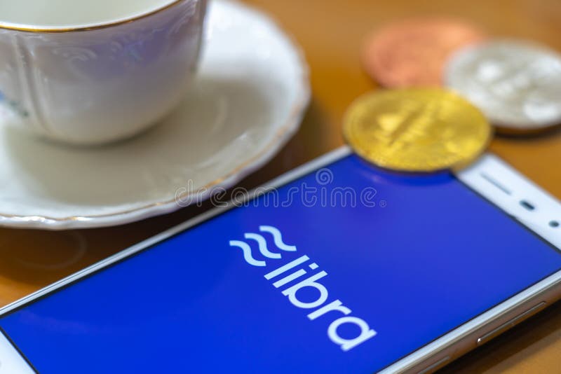Bitcoin Coin with the Facebook Logo on a Smartphone Screen Editorial ...