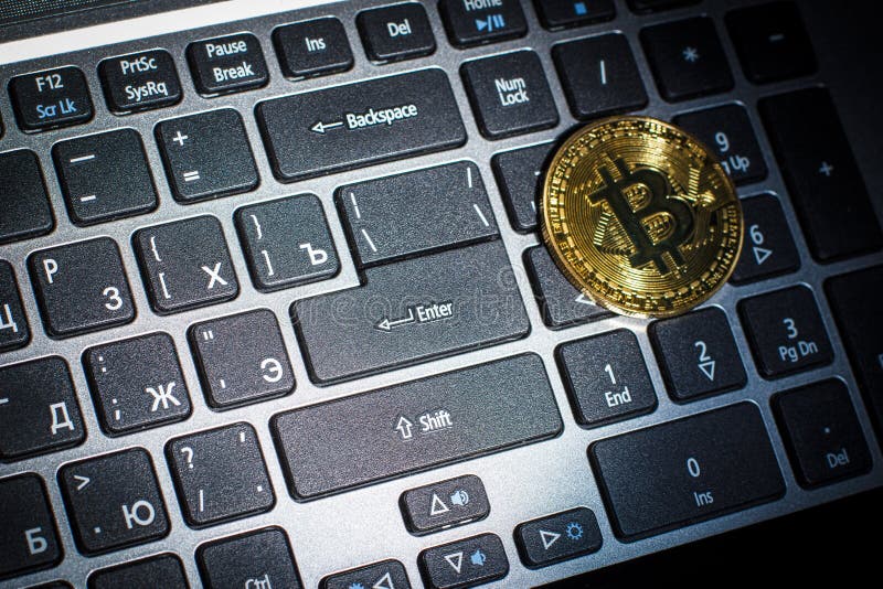 Bitcoin Coin Lies on a Black Keyboard Stock Photo - Image of coin ...