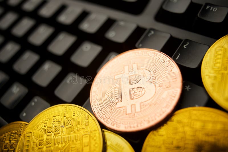 Bitcoin Coins on a Computer Keyboard Stock Image - Image of digital ...