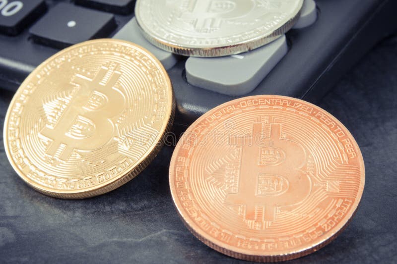 Bitcoin Coins with Computer Keyboard. Symbol of Mining Cryptocurrency ...