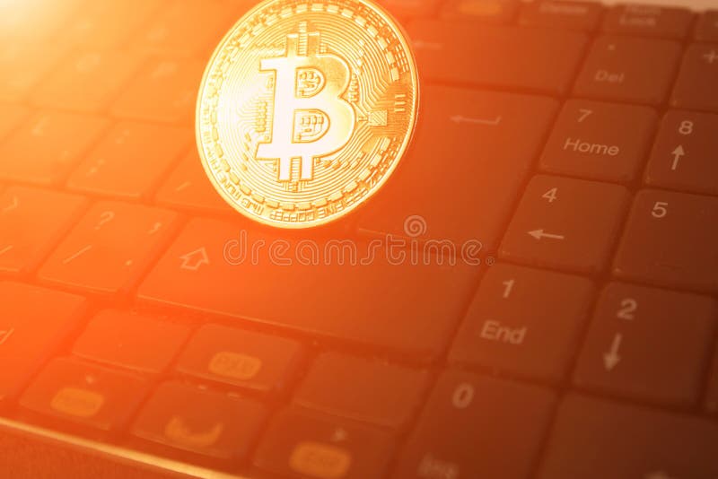 Bitcoin on a Computer Keyboard in Bright Light Landing Crypt, E Stock ...