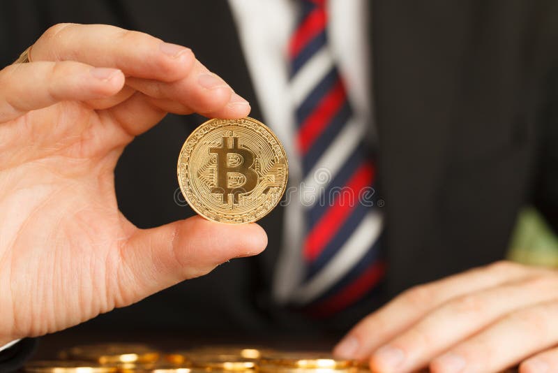 Bitcoin in the hand stock image. Image of market, coin - 114423541