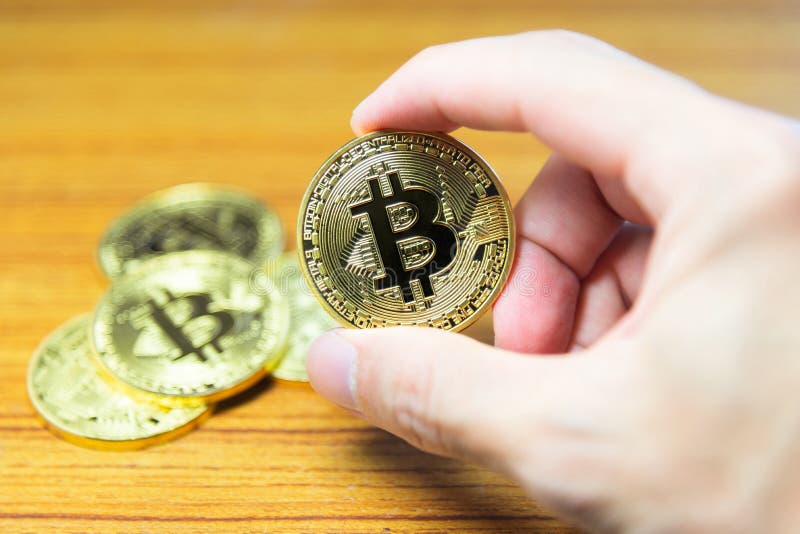 Bitcoin in Hand with Close Up View. Stock Photo - Image of cyberspace ...