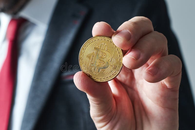 Bitcoin in the hand stock image. Image of market, coin - 114423541
