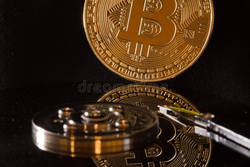 Bitcoin on hard disk stock photo. Image of bitcoin, digital - 133301884