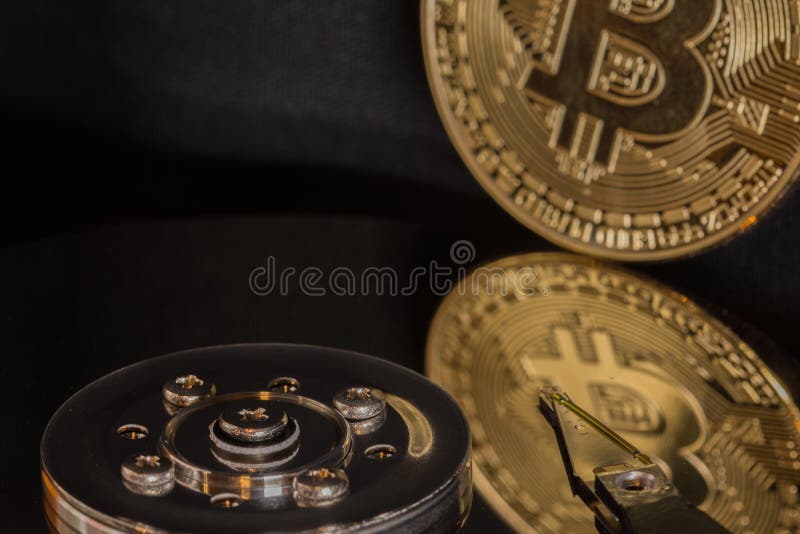 Bitcoin on hard disk stock photo. Image of investment - 133302192