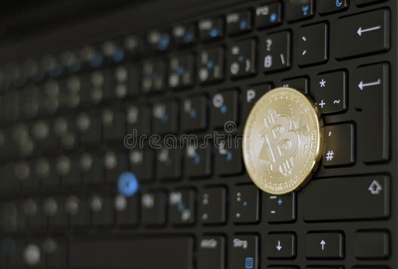 Bitcoin on laptop keyboard stock image. Image of money - 283418537