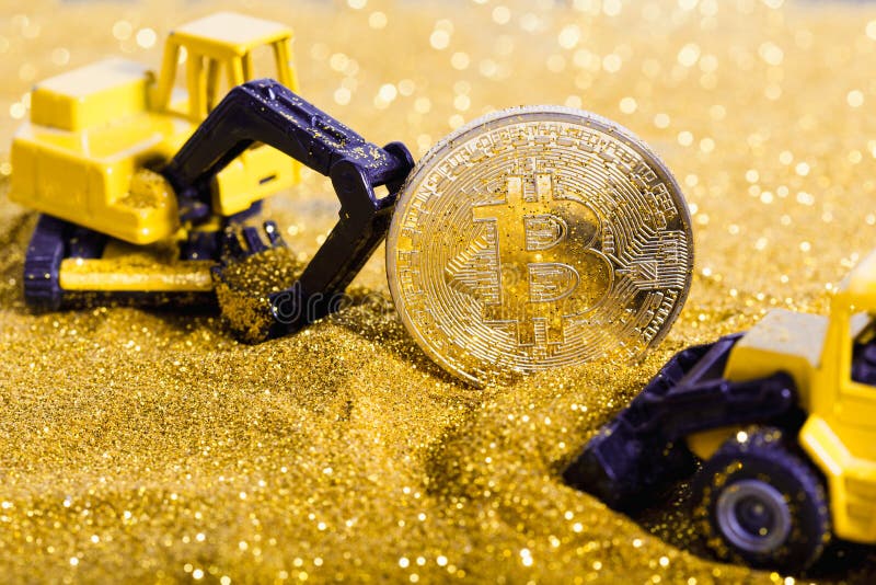 Gold Mining Concept with Construction Engine Toys Stock Photo - Image ...