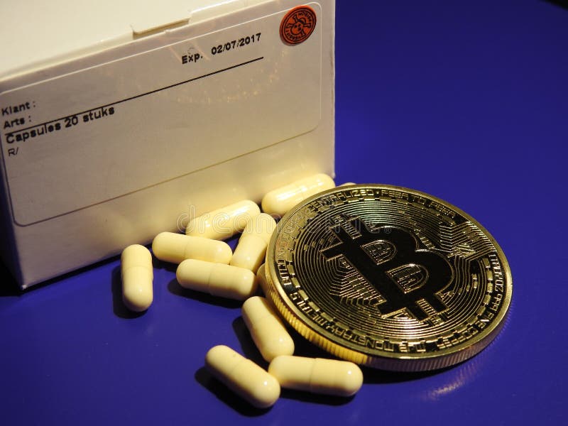 Bitcoin and pills stock image. Image of bitcoin, drop - 92307337