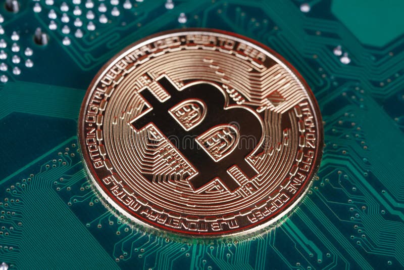 Bitcoin on circuit board stock photo. Image of business - 135751160