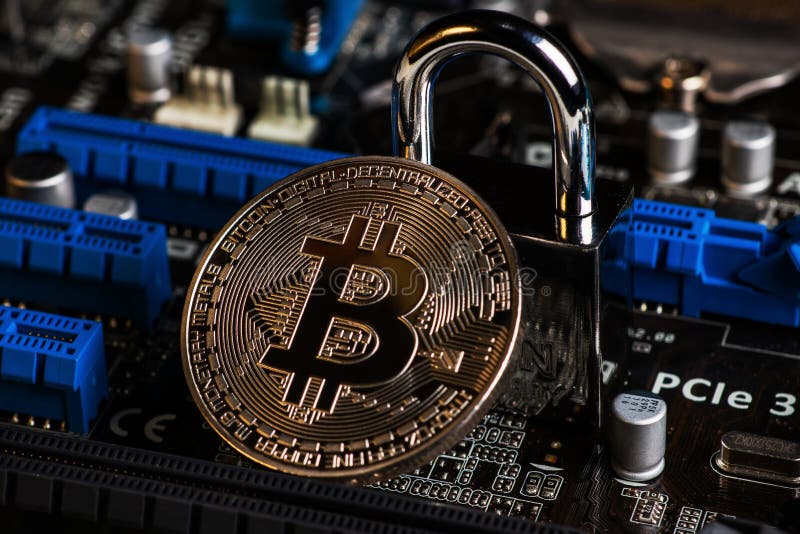 Bitcoin Security Concept. Silver Bitcoin with Padlock on Motherboard ...
