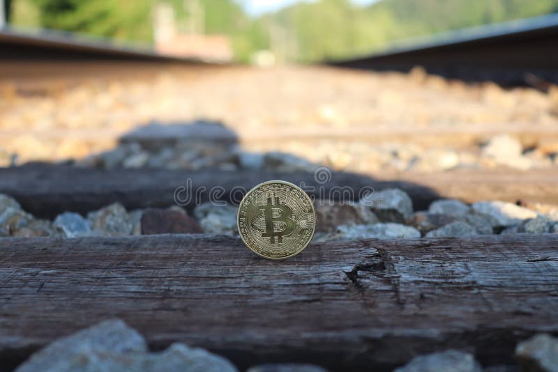 Bitcoin Token on Train Tracks, Standing on Ties Stock Photo - Image of ...