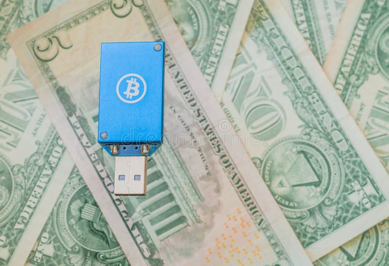 Bitcoin USB Miners on Top of American Money Stock Photo - Image of ...