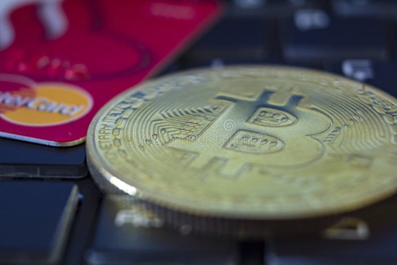 Bitcoin and Mastercard on Keyboard Editorial Photography - Image of ...