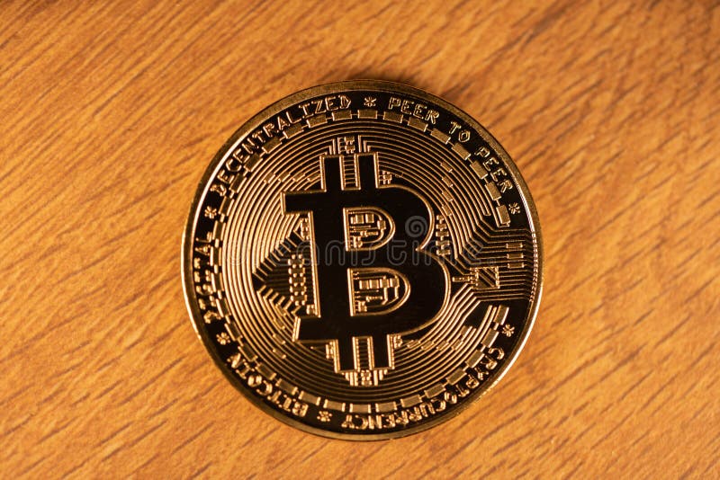 Bitcoin on Wooden Surface. Gold Coin with BTC Logo Stock Image - Image ...