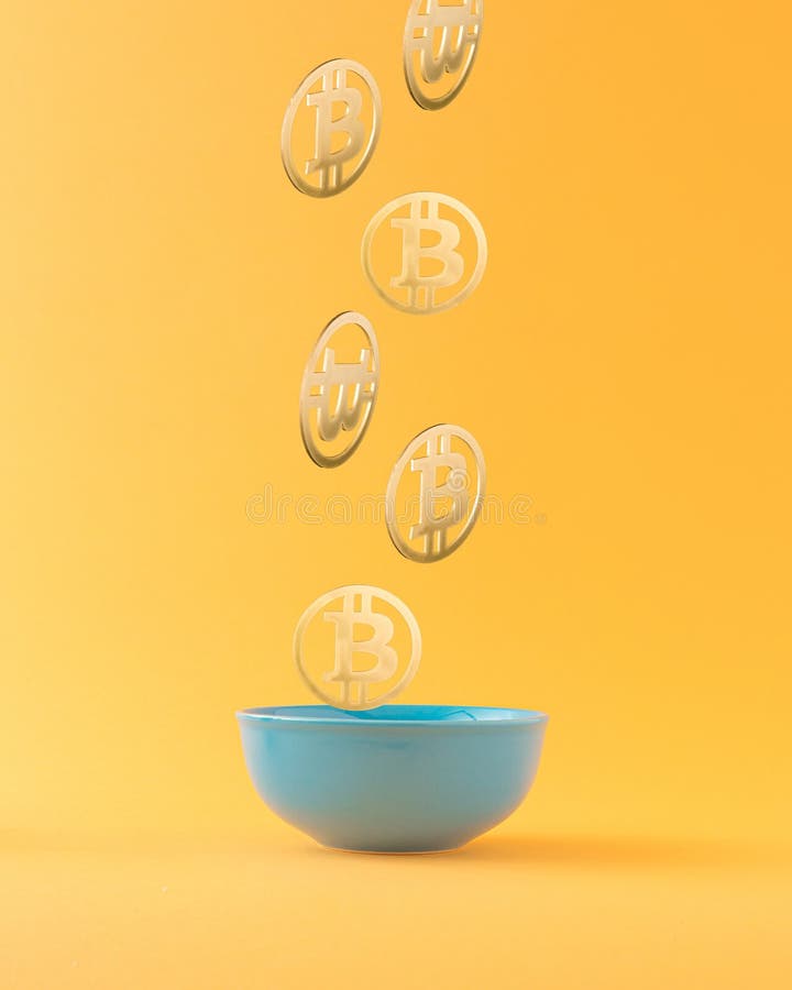 Bitcoins falling on a pile stock photo. Image of earnings - 96057220