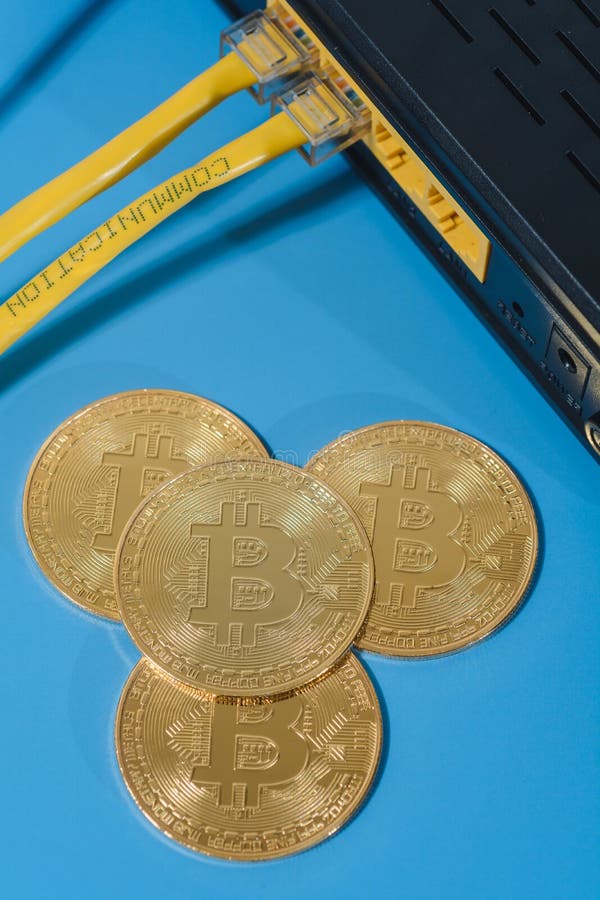 Bitcoins with Digital Ledger Connected To Laptop Device Stock Photo ...