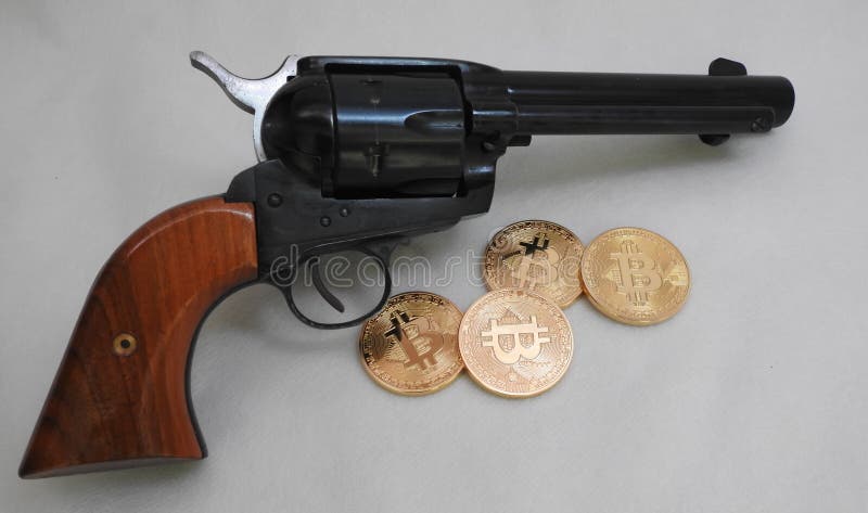 Bitcoins and revolver stock photo. Image of cryptocurrency - 94314724