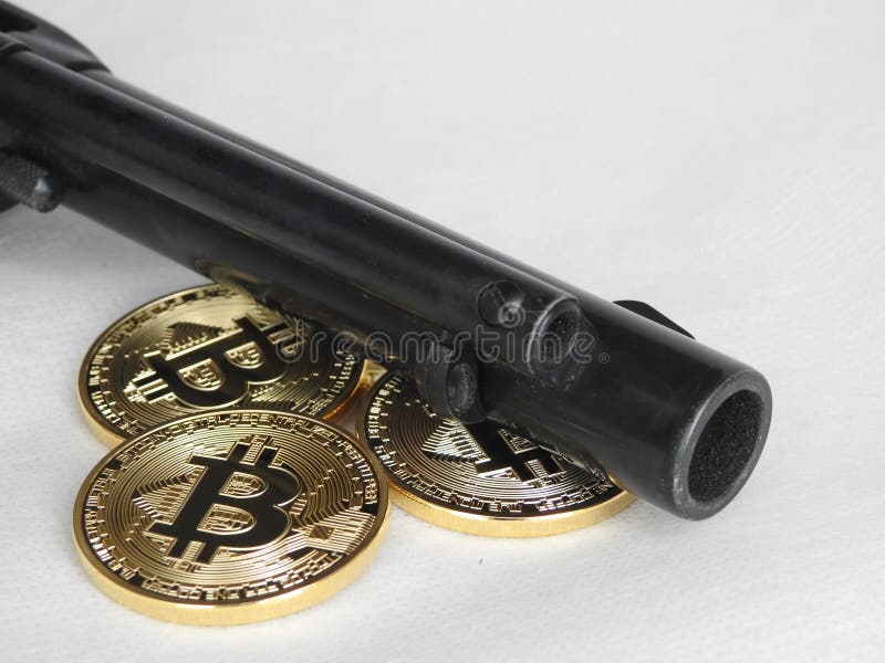 Bitcoins and revolver stock photo. Image of cash, crime - 94315086