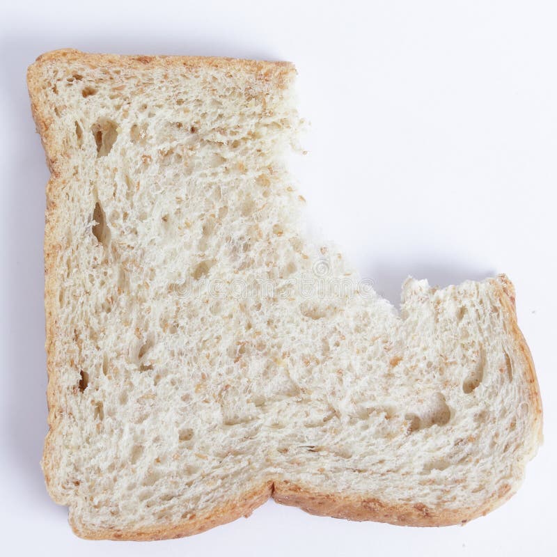 Bite off a slice of bread stock image. Image of breakfast - 12934513