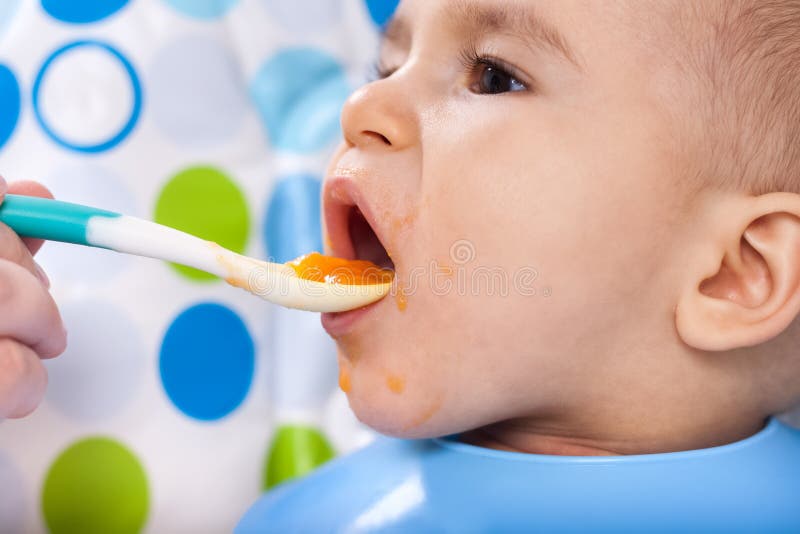 Bite of Very Hungry Baby Child Stock Photo - Image of feeding, cheerful ...