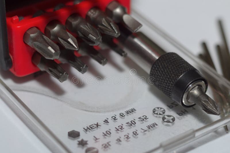 Bits Holder in Box and Many Tool Bits on White Background. Close-up ...