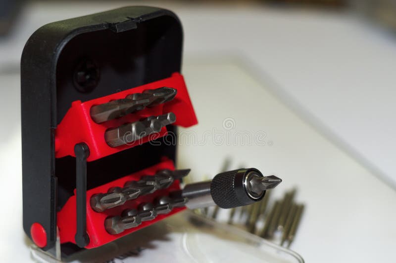Bits Holder in Box and Many Tool Bits on White Background. Close-up ...