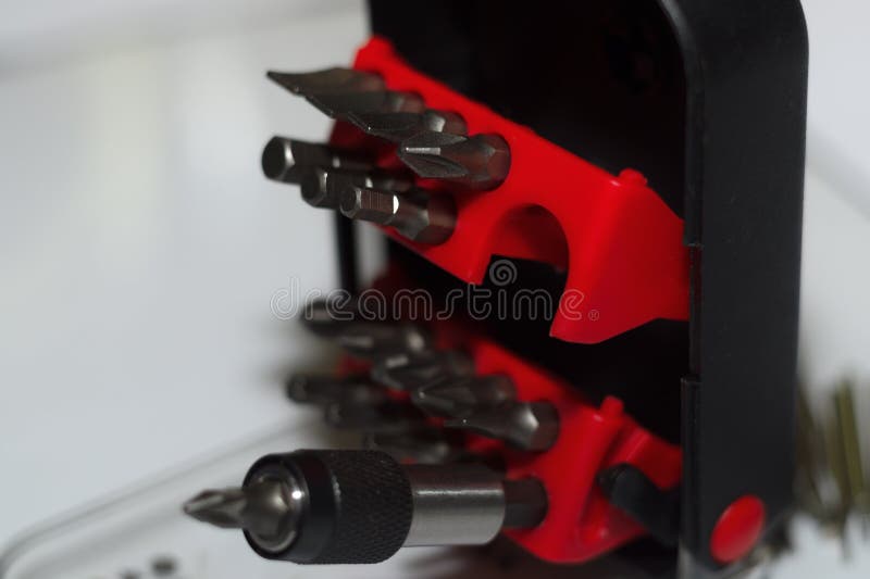 Bits Holder in Box and Many Tool Bits on White Background. Close-up ...