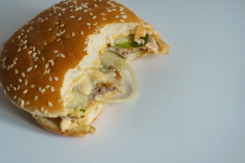 Bitten Burger on a White Background Stock Image - Image of fast ...