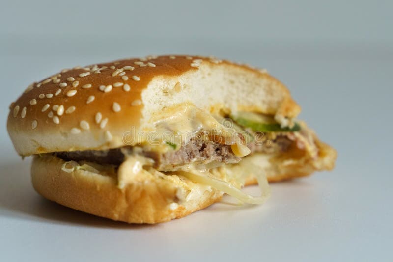 Bitten Burger on a White Background Stock Image - Image of fast ...