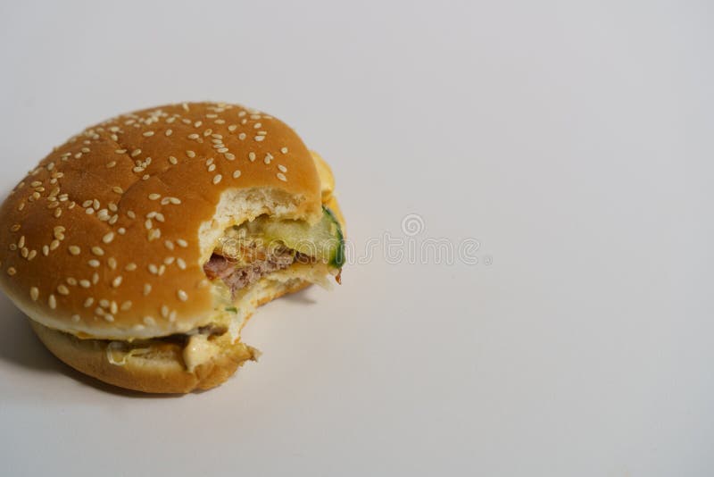 Bitten Burger on a White Background Stock Photo - Image of meal, bitten ...