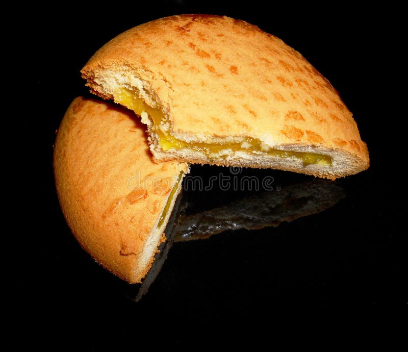 Bitten Lemon Pie on a Black Plate Stock Image - Image of multi, cream ...