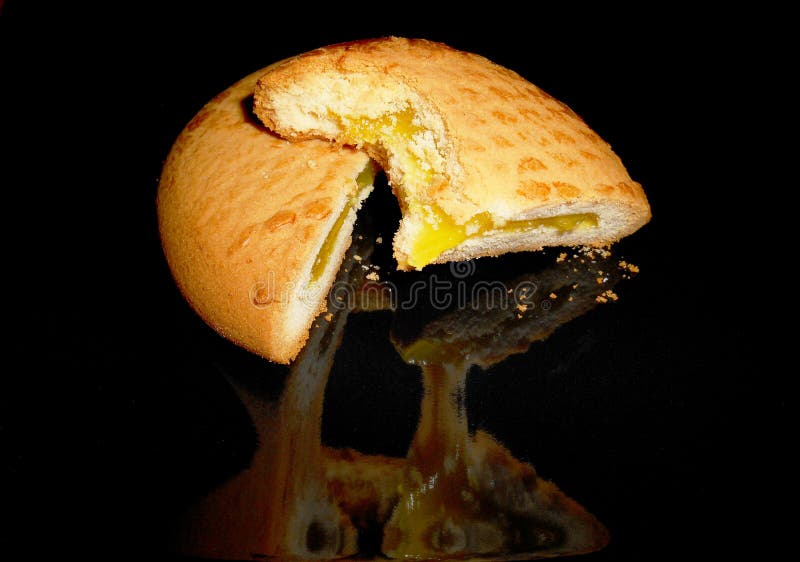 Bitten Lemon Pie on a Black Plate Stock Image - Image of bitten ...