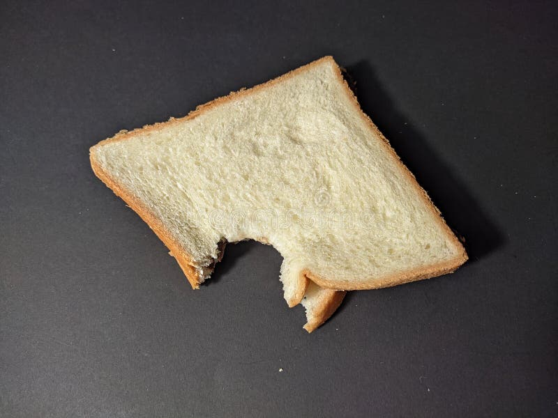 Bitten Sandwich with Chocolate Isolated on Black Stock Image - Image of ...