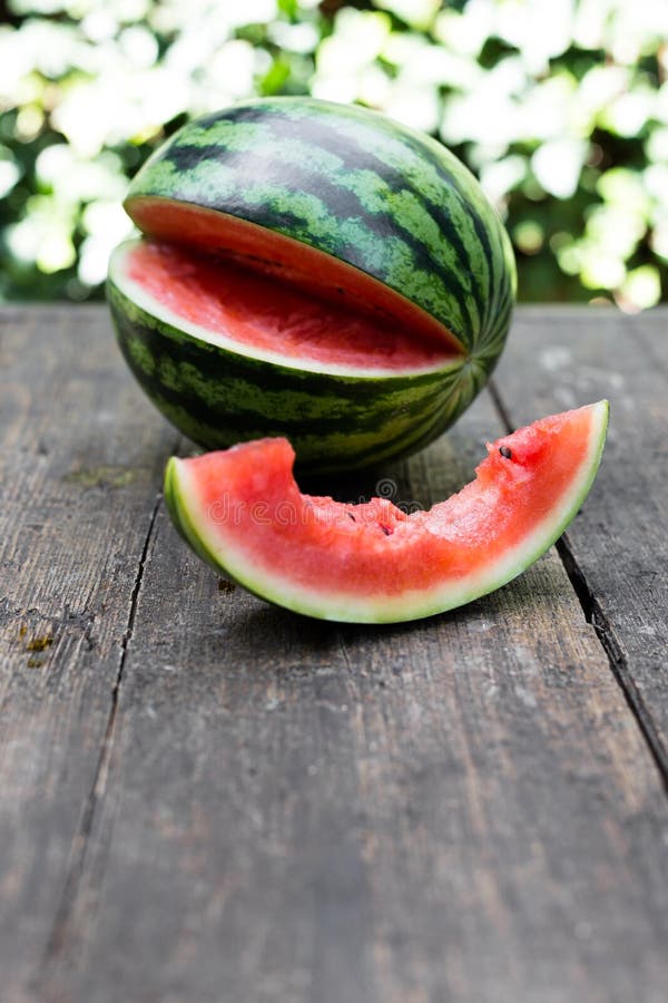 Bitten slice of watermelon stock photo. Image of slice - 76159738