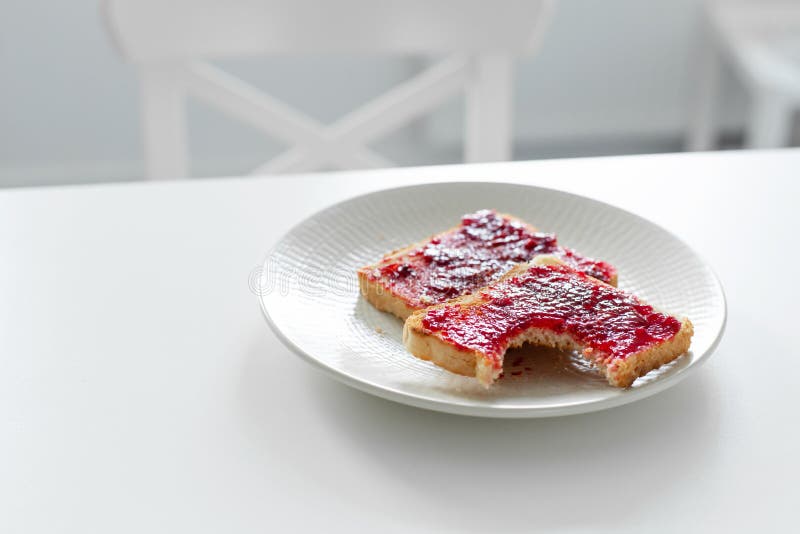 Bitten Toast with Jam on the Table. Late for Work Did Not Have Time To ...