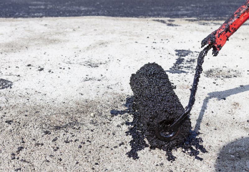 Bitumen on a Concrete Surface with a Roller, Waterproofing. Close-up ...