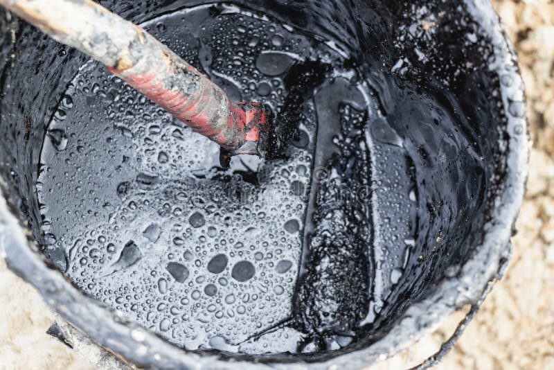 Bituminous Mastic for Waterproofing in a Bucket. Application of ...