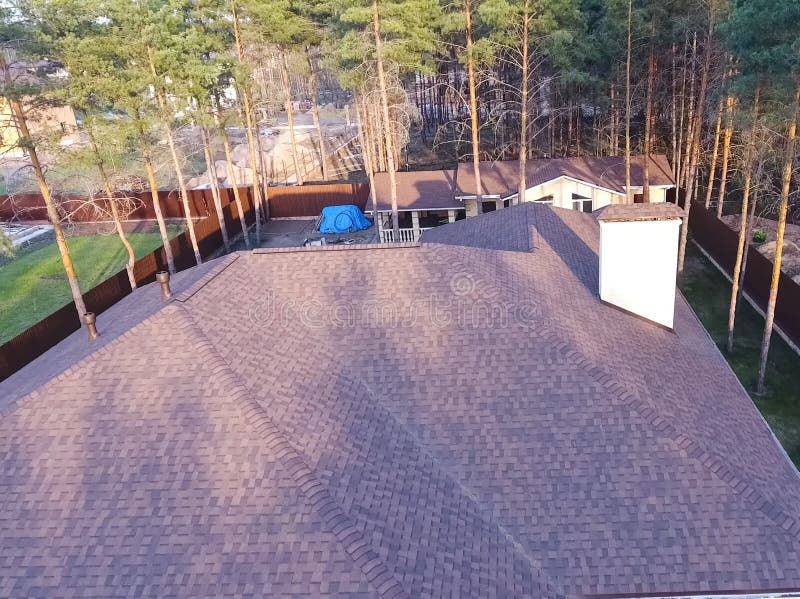Bituminous Tile for a Roof. House with a Roof from a Bituminous Stock ...