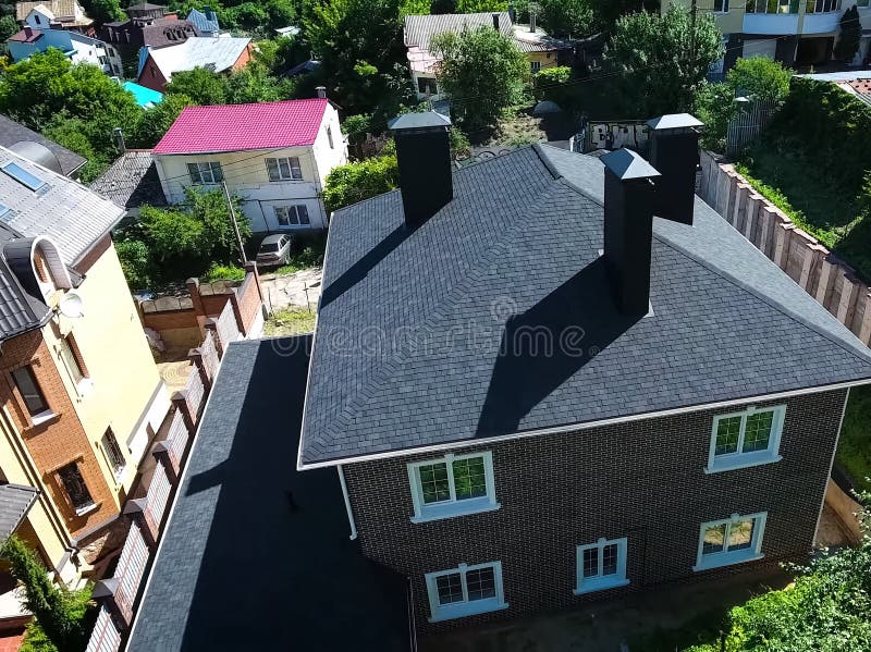 Bituminous Tile for a Roof. House with a Roof from a Bituminous Stock ...
