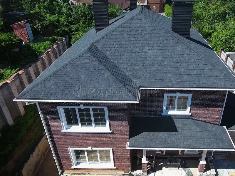Bituminous Tile for a Roof. House with a Roof from a Bituminous Stock ...