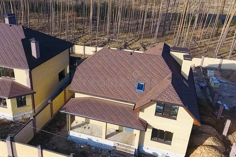 Bituminous Tile for a Roof. House with a Roof from a Bituminous Stock ...