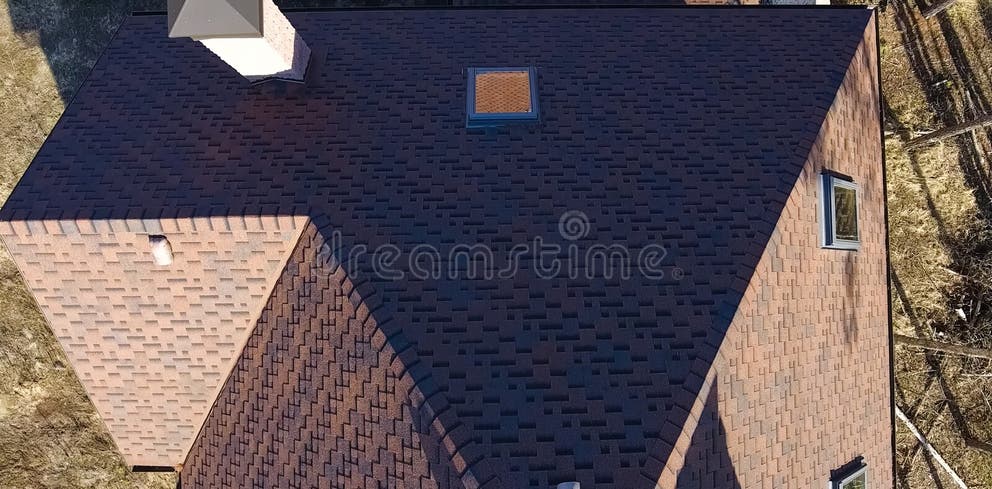 Bituminous Tile for a Roof. House with a Roof from a Bituminous Tile. a ...